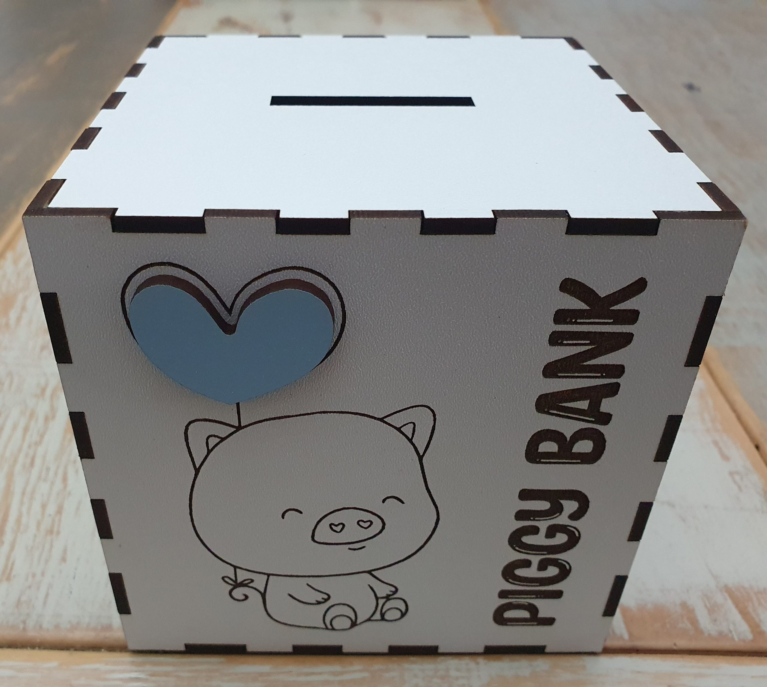 E0011 - Piggy Banks - Laser Lief